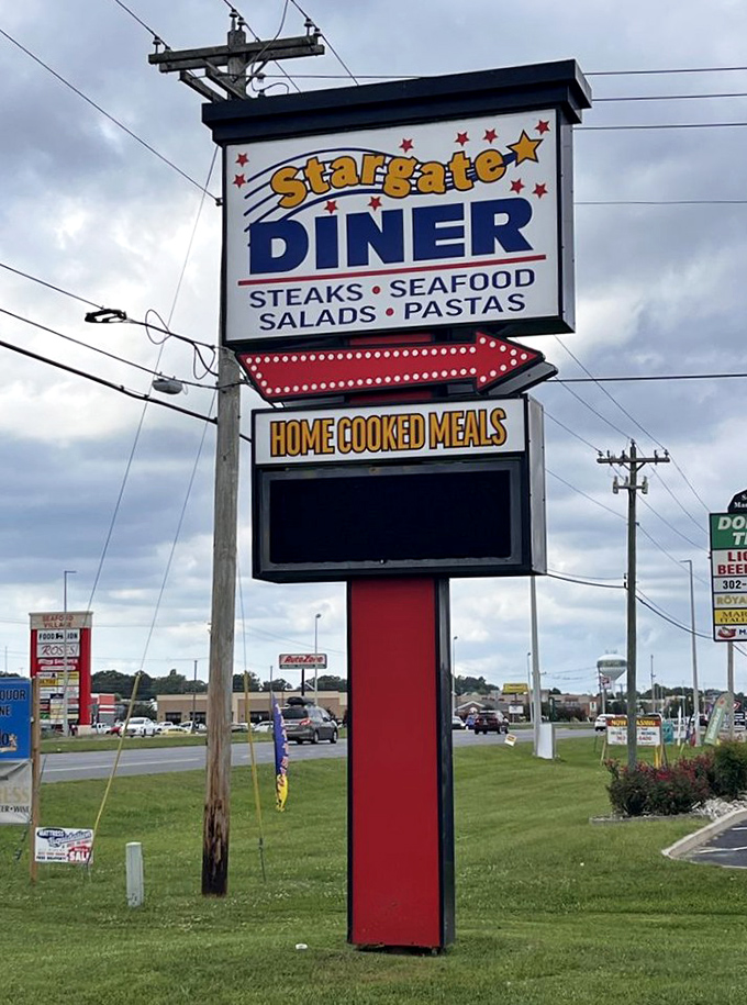 The roadside sign stands tall like a culinary lighthouse, guiding hungry travelers toward breakfast salvation.