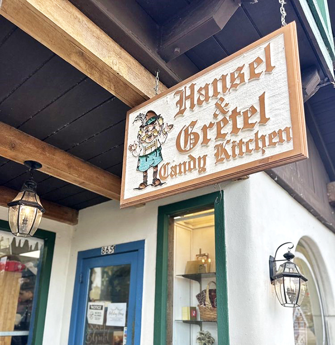 That iconic sign hanging above the blue door—a beacon for sweet-toothed pilgrims who've made the journey to this sugar sanctuary.