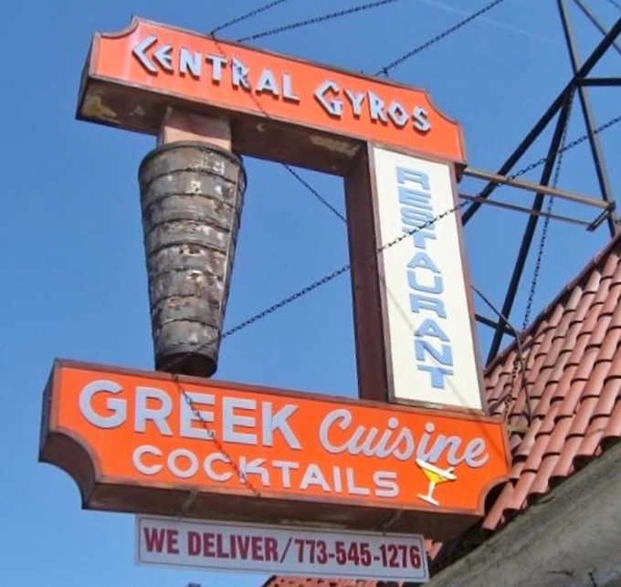 Bold signage announces this temple to Greek cuisine, complete with gyros cone promising delicious adventures within.