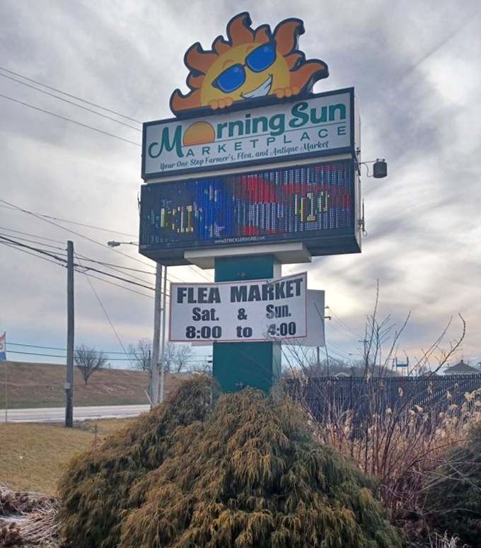 The cheerful sun-wearing-sunglasses sign welcomes bargain hunters to MorningSun Marketplace, promising weekend treasures from 8 to 4.