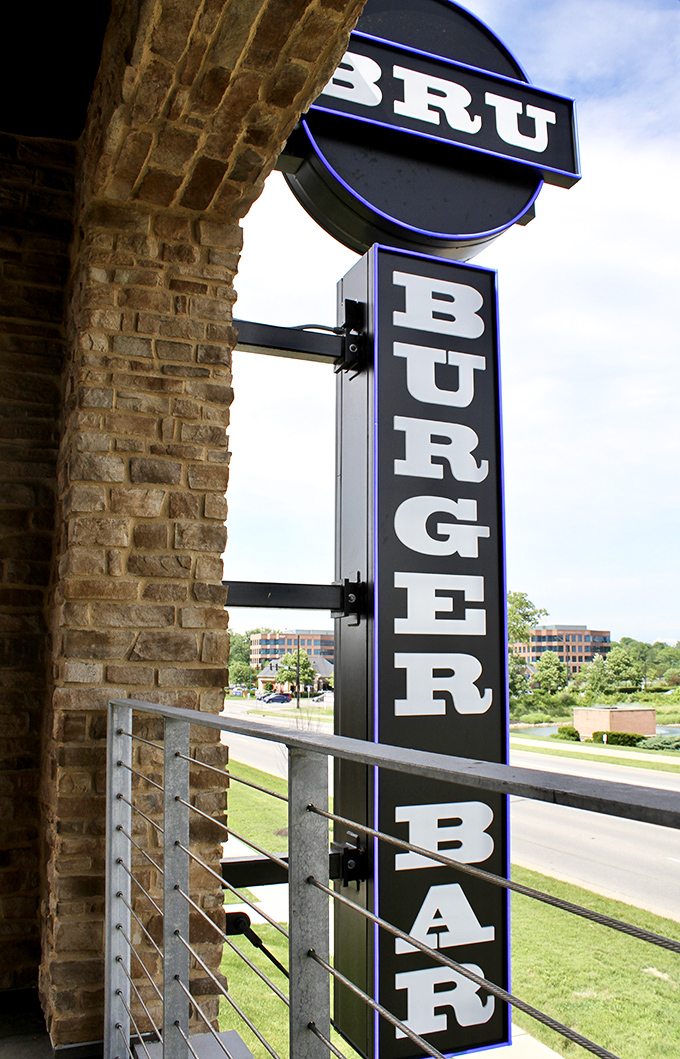 The sign stands tall and proud, like a beacon for the burger-obsessed. No cryptic messaging here&mdash;just a straightforward promise of deliciousness.