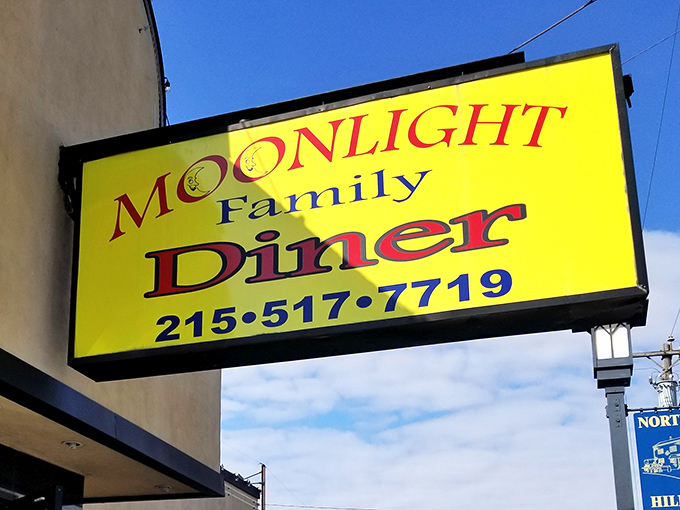 The yellow sign shines like culinary gold against the blue sky. Not just a sign&mdash;a promise of good things to come for hungry travelers.
