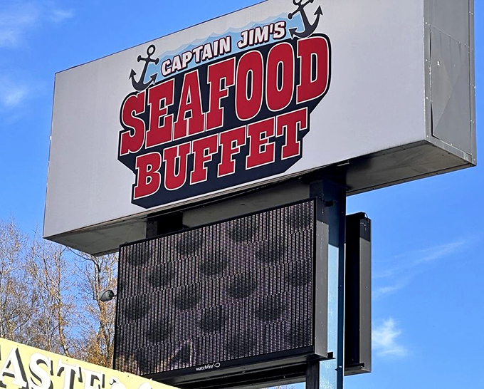 The sign stands proud against the Tennessee sky, a beacon for hungry travelers seeking maritime flavors in mountain country.