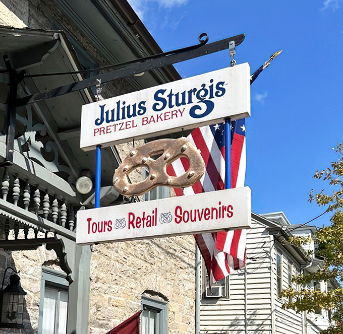 The sign says it all: Tours, Retail, Souvenirs. But what it doesn't mention is the time-travel experience waiting just beyond those historic stone walls.
