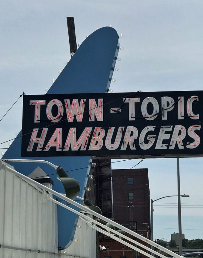 That distinctive fin-shaped sign has guided hungry Kansas Citians through night and day, standing tall like a culinary lighthouse.