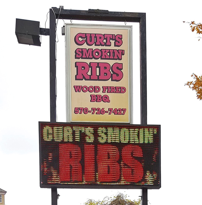 The sign doesn't just announce a restaurant &ndash; it's a beacon for those seeking refuge from a world of mediocre barbecue.