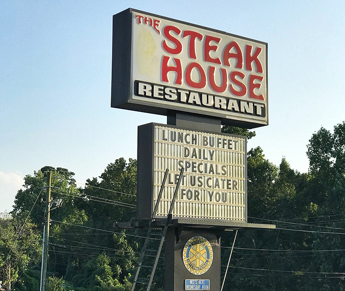 The sign stands as a beacon of hope for hungry travelers. Like a lighthouse, but guiding you to biscuits instead of rocky shores.