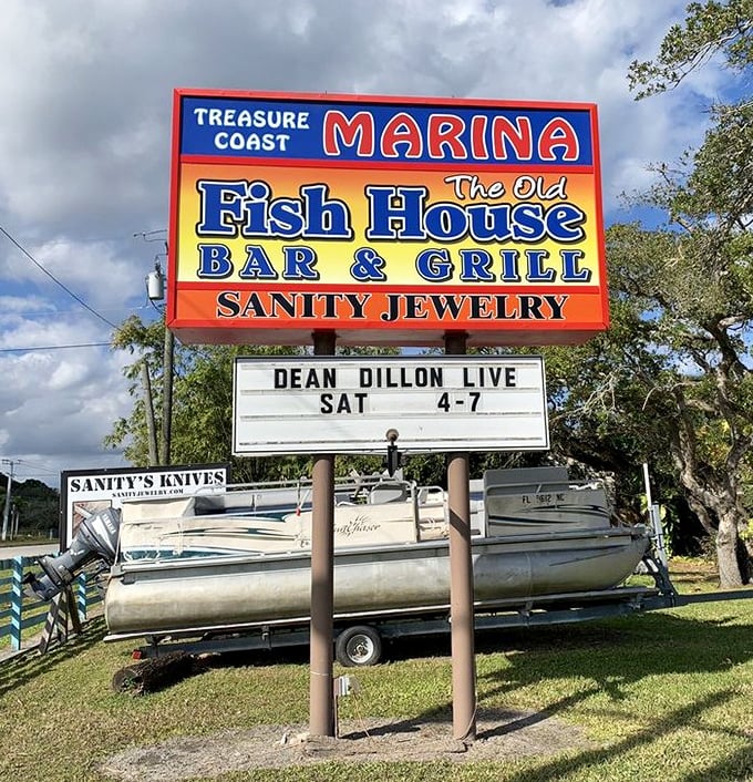 The kind of roadside sign that makes you immediately cancel whatever plans you had and make a U-turn&mdash;because live music and fresh seafood trump everything.