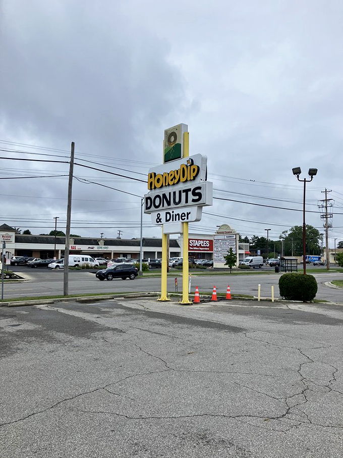 The roadside sign&mdash;a yellow beacon of hope for the hungry traveler. No fancy digital displays needed when the food speaks for itself.