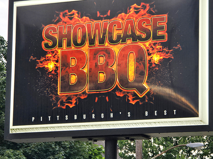 The sign says it all. When flames surround your logo, you're making a promise about flavor that Showcase BBQ delivers on spectacularly.