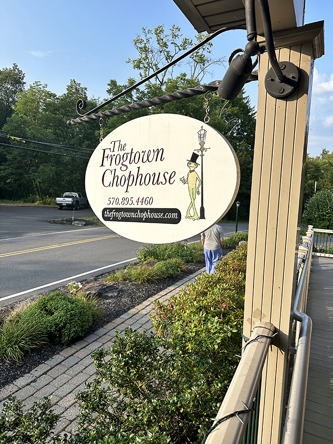 The charming sign swings gently in the breeze, like a friendly neighbor waving you over for the best meal of your life.