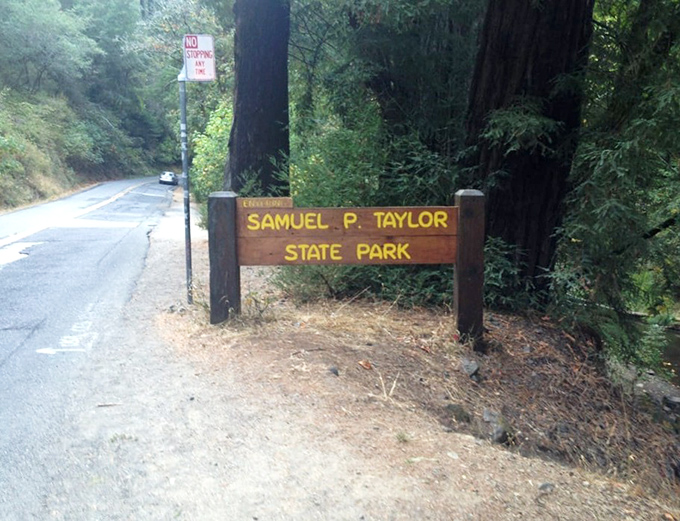The unassuming entrance sign&mdash;like finding the door to Narnia on the side of a regular road. Adventure begins with a simple turn.