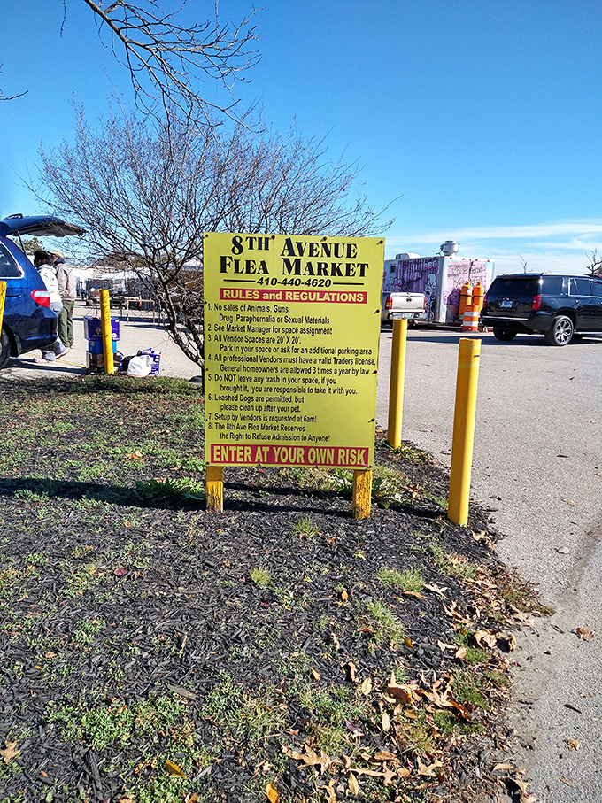 The yellow sign that promises adventure – "Enter at Your Own Risk" might as well read "Treasures Await Those Brave Enough to Browse."
