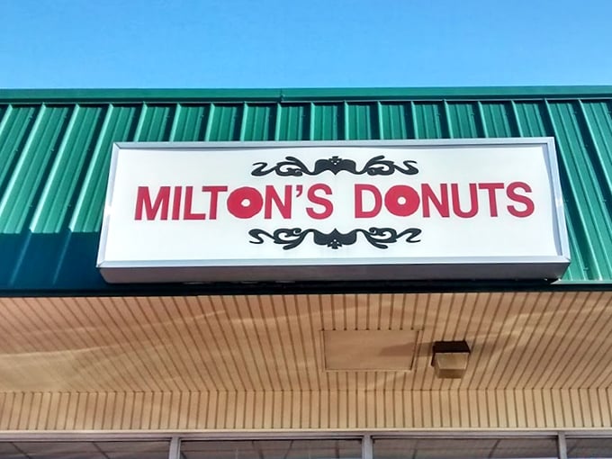 The sign that launches a thousand cravings. Simple, straightforward, and promising exactly what it delivers&mdash;donut perfection.