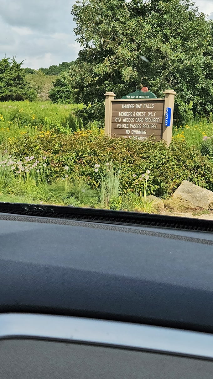 The official greeter to Illinois' best-kept secret. This sign marks the entrance to Thunder Bay Falls, where members and guests discover liquid treasure.