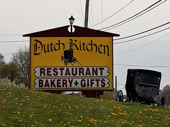 The sign says "Restaurant, Bakery, Gifts" but really means "Happiness, Joy, and Things to Remember It By."