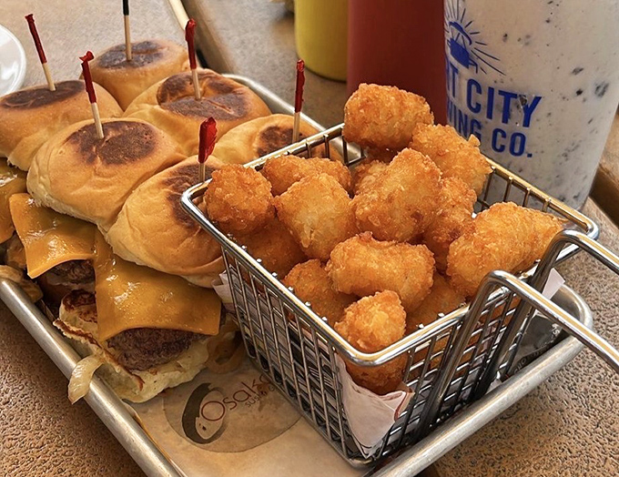 Sliders that prove good things come in small packages. Paired with golden tater tots, it's childhood nostalgia upgraded for sophisticated palates.