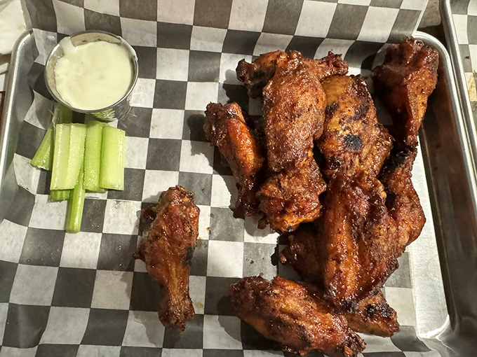 Wings that have achieved smoky perfection&mdash;crisp outside, juicy inside, with celery standing by for that cool, crunchy counterpoint to the heat.