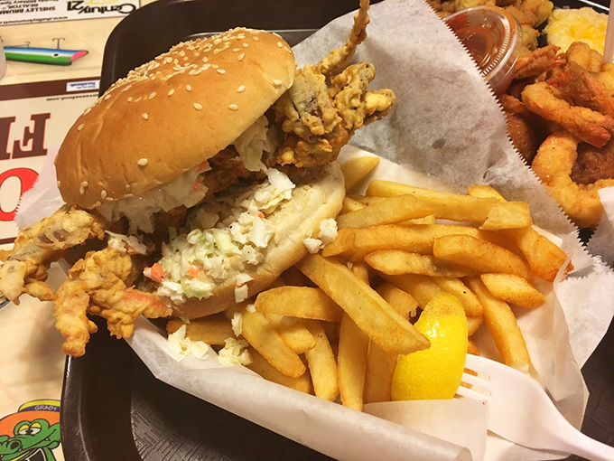A soft shell crab sandwich that's worth getting your hands messy for. Crispy legs peek out from under the bun like they're waving hello to your taste buds.