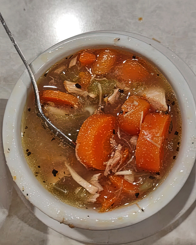 Homemade soup that would make your grandmother nod in approval &ndash; chunks of chicken and carrots swimming in broth that tastes like someone cared.