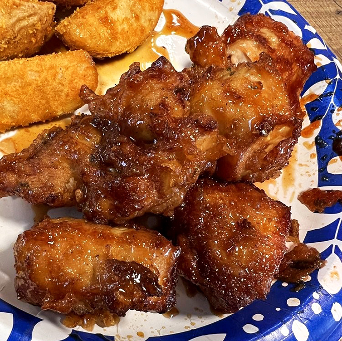 Soy garlic boneless chicken glistens with umami-rich sauce that'll convert any fried chicken skeptic immediately.