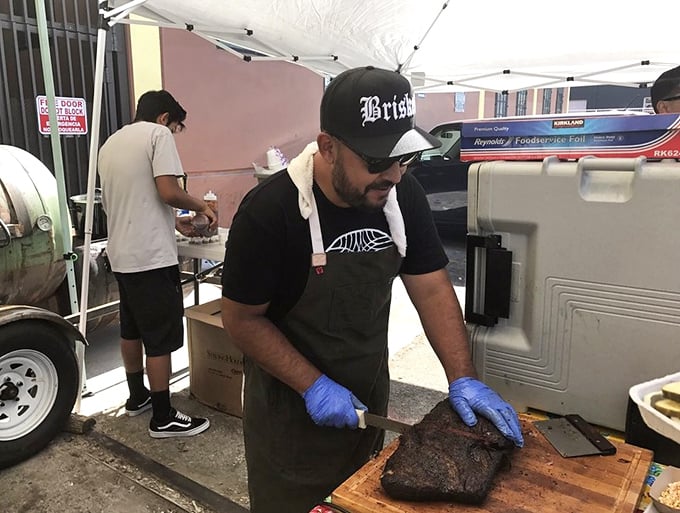 Barbecue is a hands-on affair. Blue-gloved pit masters slicing brisket with the precision and reverence of diamond cutters.