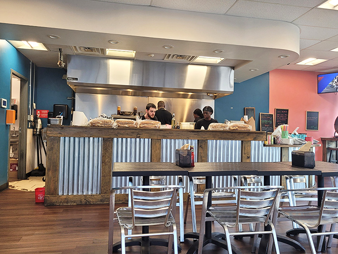 Where the sandwich magic happens. The open kitchen design lets you witness the care that goes into every order before it reaches your table.