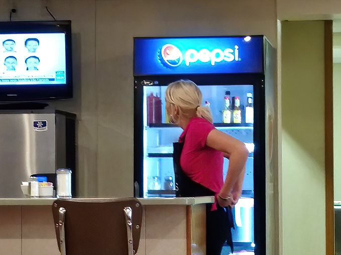 Behind every great small-town restaurant is a staff that treats the soda machine like mission control—precision and purpose in every pour.