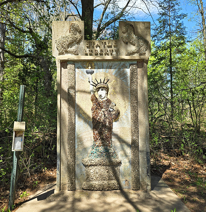 Lady Liberty, Northwoods edition&mdash;proving that freedom, like good folk art, stands tall even when constructed from humble materials.