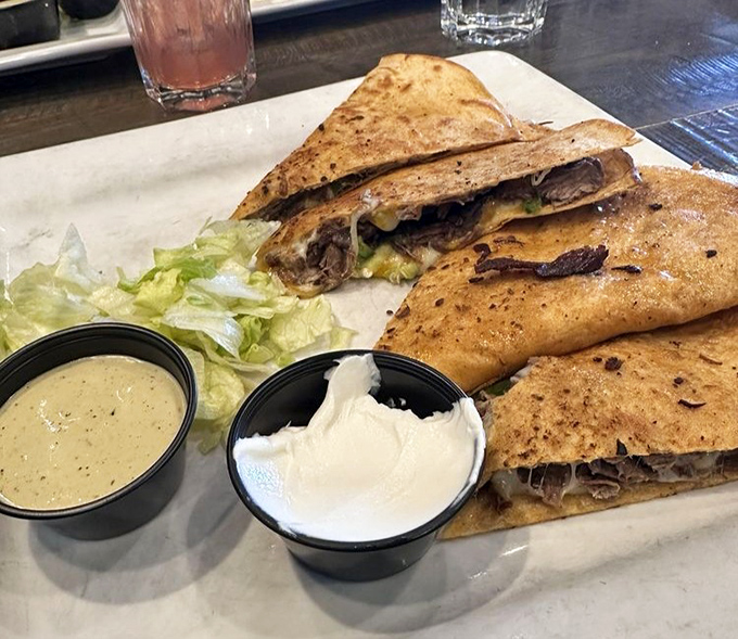 This quesadilla isn't just a meal, it's an architectural achievement&mdash;layers of melty cheese and steak folded into crispy perfection.