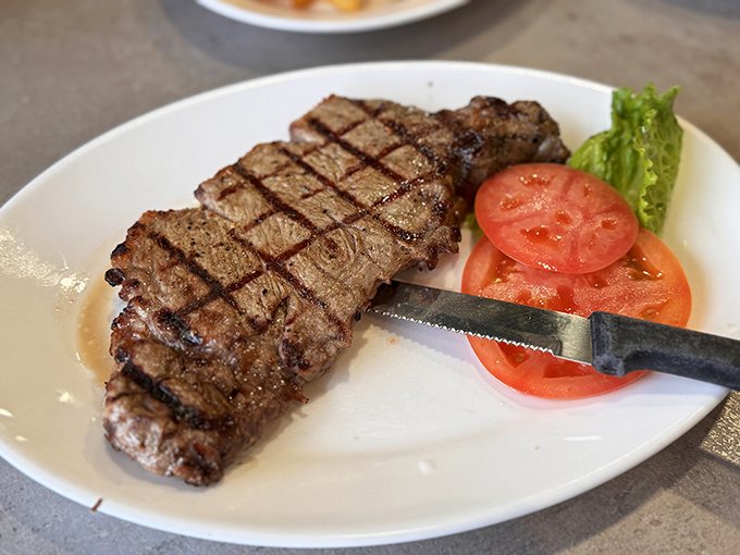 A perfectly grilled steak that needs no introduction&mdash;just a sharp knife, a hungry diner, and perhaps a moment of respectful silence before diving in.