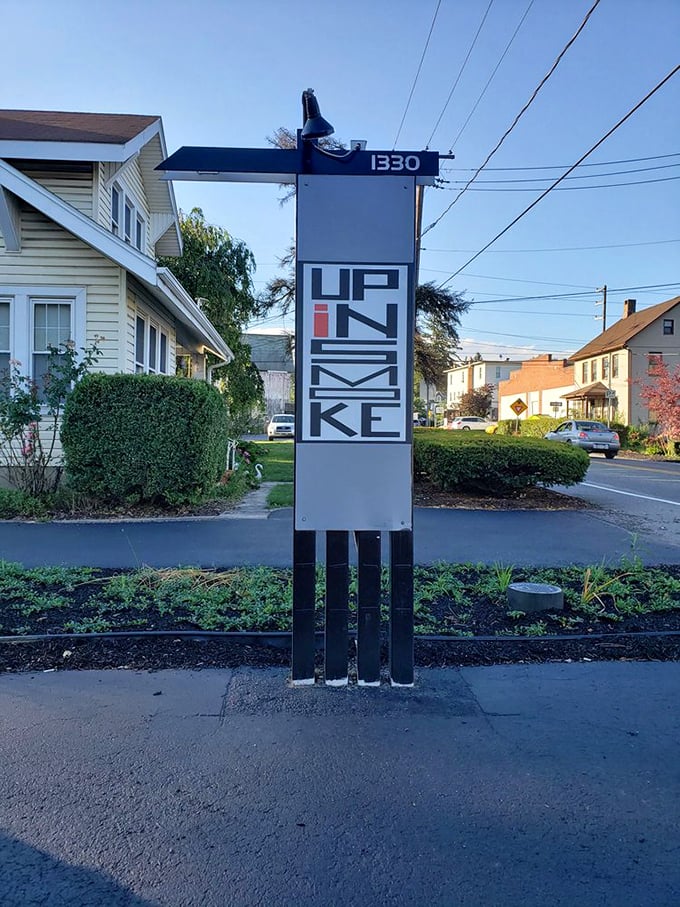 The street sign stands like a beacon of hope for the hungry &ndash; follow it to find your barbecue salvation. 
