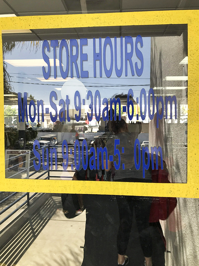 The store hours sign: your guide to planning thrift expeditions with military precision. Early birds get the vintage worms!