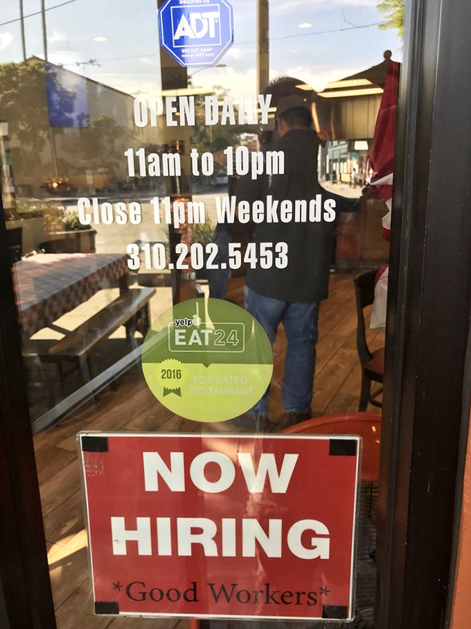 The door that separates ordinary life from extraordinary chicken. Those hours are worth committing to memory.