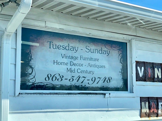 The store hours sign reveals the rhythm of treasure hunting&mdash;Tuesday through Sunday, when vintage dreams become tangible possibilities.