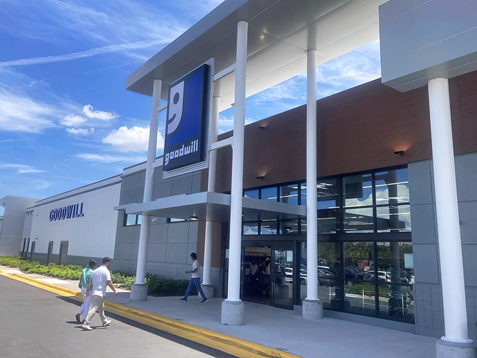 The modern storefront beckons with its clean lines and bright logo &ndash; a far cry from thrift stores of yesteryear, promising air conditioning and organized chaos within.