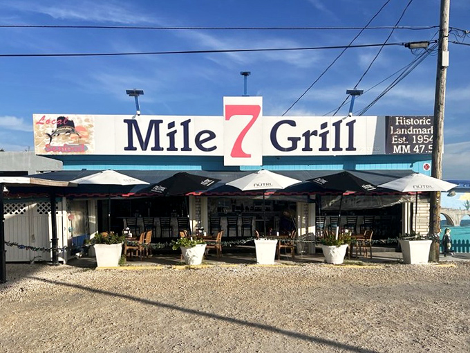 White planters and blue umbrellas frame the entrance to this Marathon institution&mdash;a humble exterior that belies the culinary treasures waiting inside.