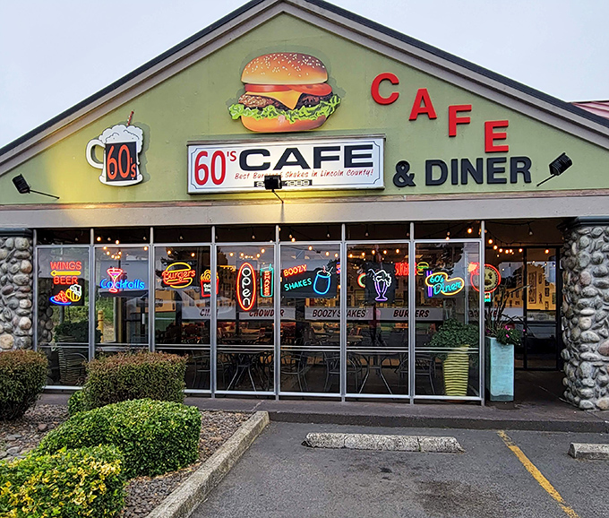 As dusk approaches, the neon signs glow like beacons through the windows, promising comfort food salvation to weary Highway 101 travelers.