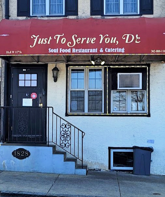 The address might say 1828 W 11th Street, but your taste buds will call it home. This storefront promises more than it shows.