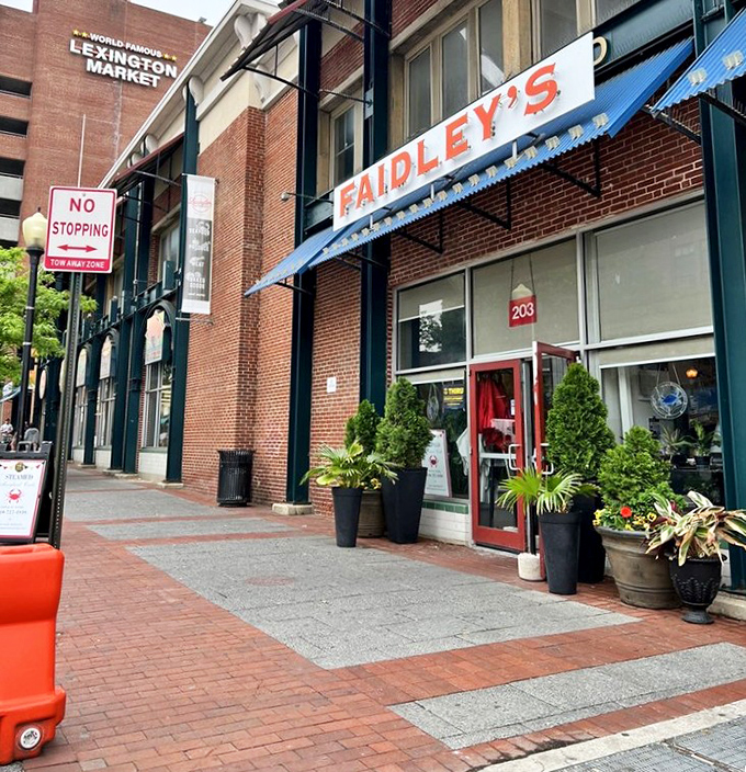 The historic Lexington Market facade houses seafood greatness within. This isn't just a restaurant&mdash;it's a Baltimore institution.