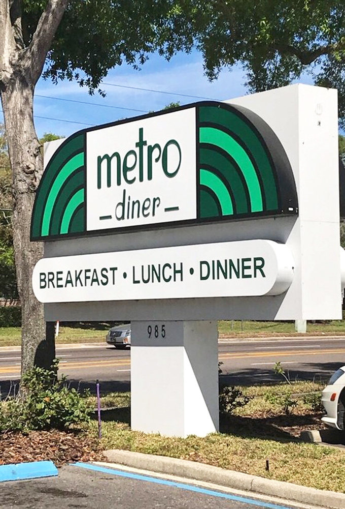 The sign that's guided hungry travelers like a lighthouse beacon of breakfast hope. Three meals a day, seven days a week&mdash;because food emergencies don't take holidays.