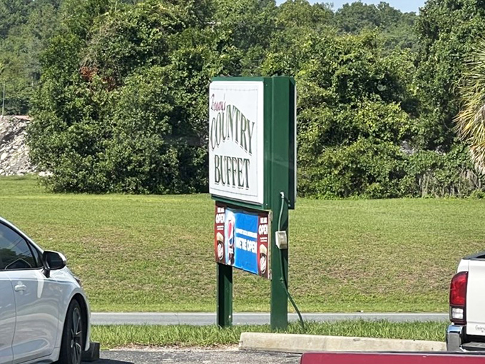 The roadside sign stands as a simple landmark for those in the know. No flashy neon needed when word-of-mouth has already done the marketing.