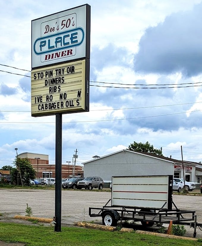 That roadside sign isn't just announcing a restaurant&mdash;it's a beacon of hope for hungry travelers seeking authentic diner magic.