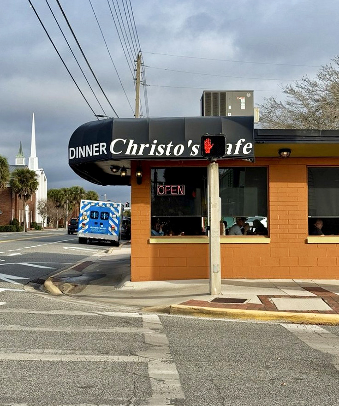 From the street, Christo's glowing "OPEN" sign might be the most beautiful three letters in the English language when you're hungry.