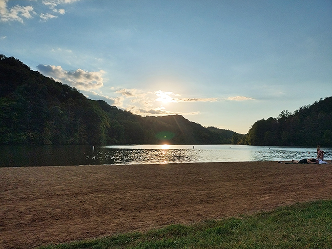 As the sun sets over Dow Lake, the day's final rays create a golden pathway across the water&mdash;nature's own red carpet finale to a perfect day outdoors.