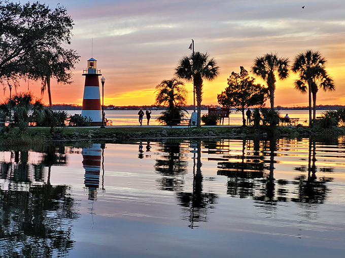 The lighthouse at sunset creates postcard-perfect moments daily, proving that Mother Nature saves her best light shows for Mount Dora's evening performances.