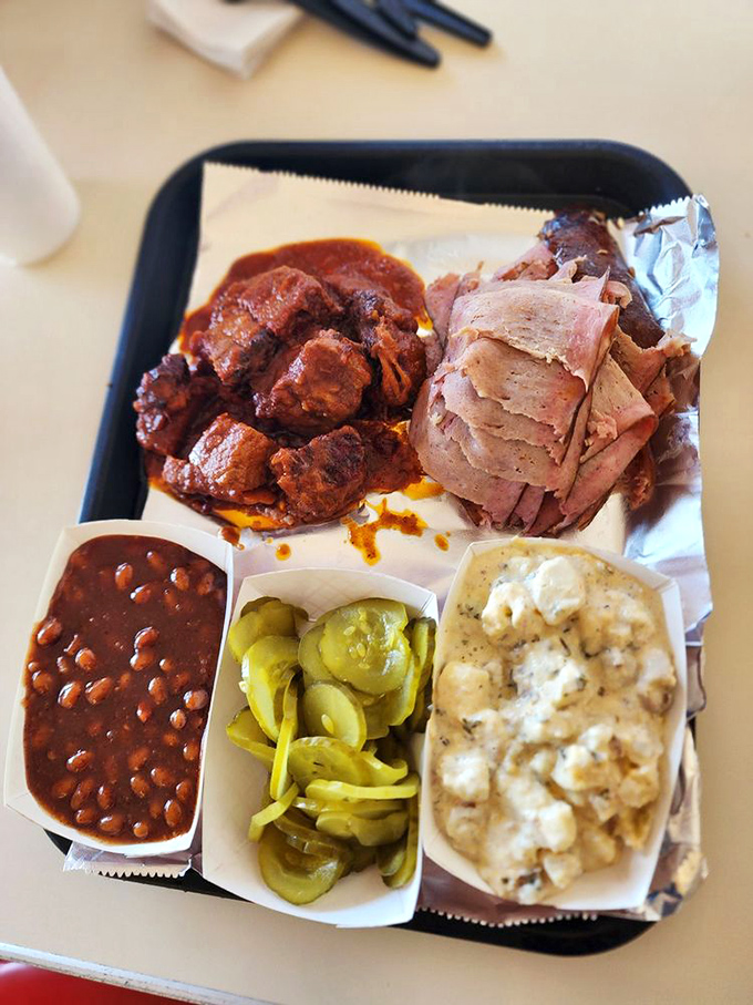 A tray that tells the complete Kansas City BBQ story. Meat, sides, and pickles&mdash;the holy trinity of proper barbecue consumption.