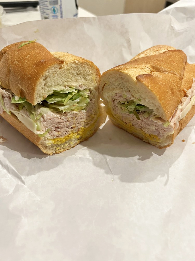 This isn't just lunch; it's edible architecture &ndash; layers of flavor built on foundations of fresh bread and tradition.