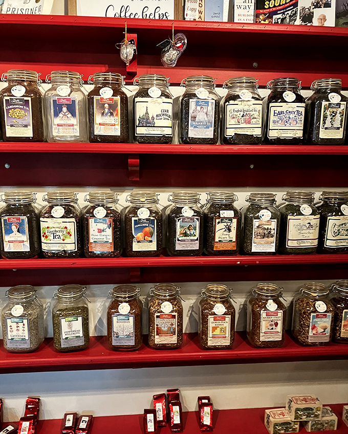 Coffee's sophisticated cousins line up in labeled jars &ndash; a tea library where each variety tells its own aromatic story.