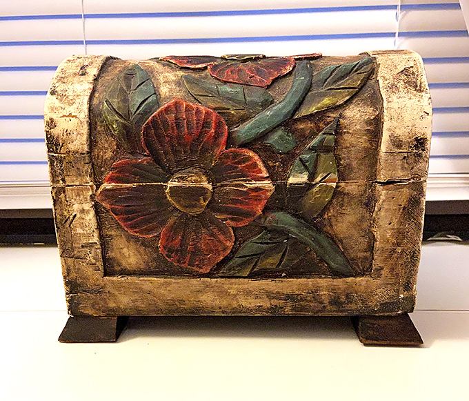 This carved wooden box isn't just decor – it's someone's handcrafted story, a conversation piece that brings character no big box store can replicate.